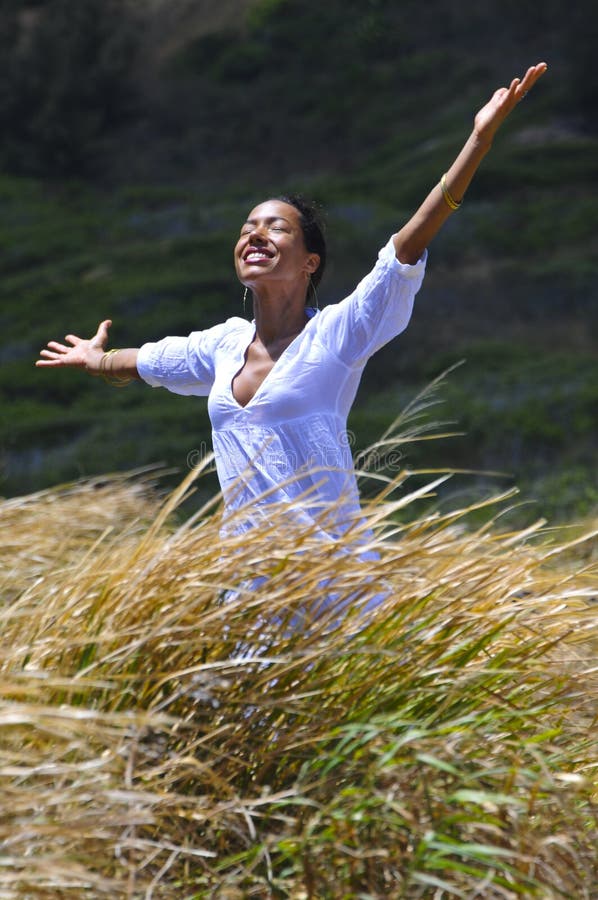 Embracing the Sun stock photo. Image of meadow, smiling - 20150192