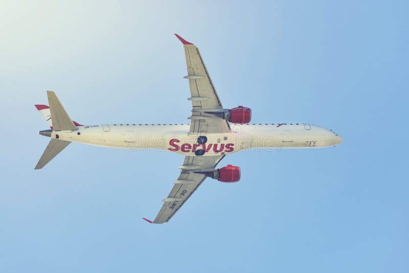 Embraer ERJ-195 - Austrian Airlines on a Blue Sky Editorial Stock Photo ...