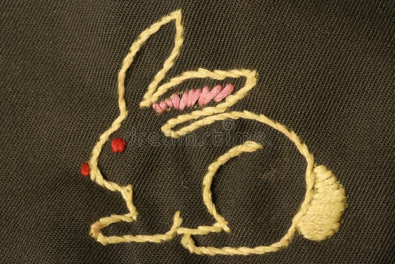 Embroidered rabbit stock photo. Image of clothes, animals - 7582748