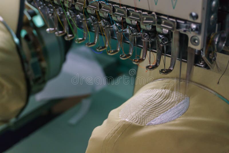 Embroidery Cap in Progress in Textile Industry at Garment Manufacturers ...
