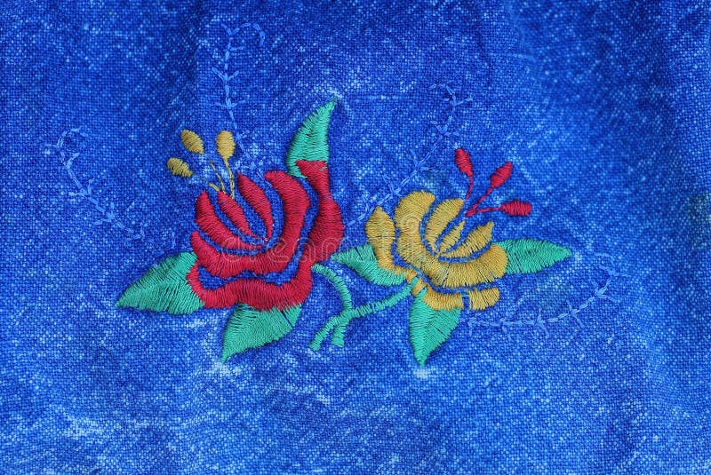Embroidery with Colored Threads in the Form of Two Flowers Stock Image ...