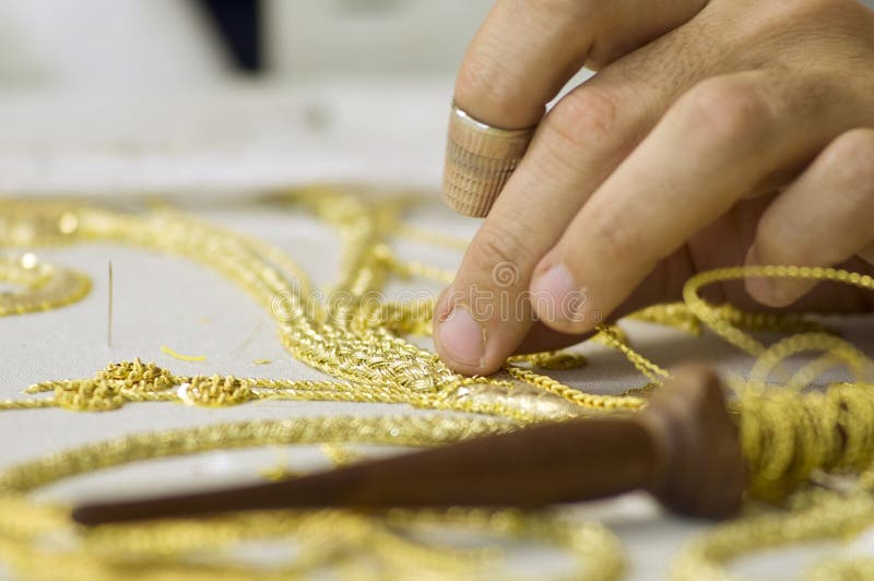 Embroidery in gold stock photo. Image of colorful, cloth - 7106280