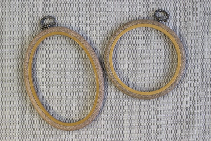 Embroidery Hoop, Oval and Round Frames on Rough Grey Linen, Top View ...