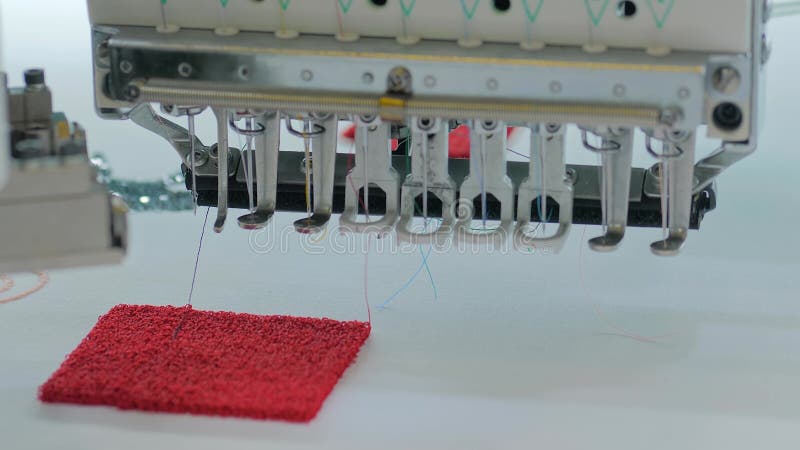 Embroidery Machine is Creating Decorative Textile Pattern on the Fabric ...