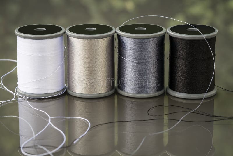 Embroidery thread reels stock image. Image of close, orange - 97603803