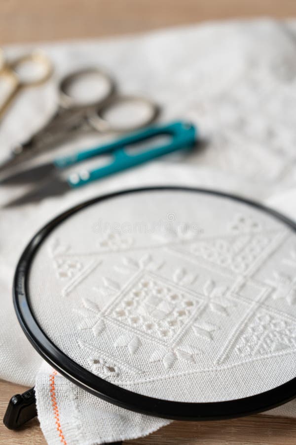 Embroidery Tools and Fabric Featuring Intricate Whitework Design Stock ...