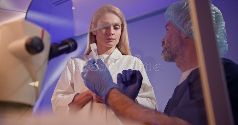 Embryologist Conducts Artificial Fertilization in Advanced Laboratory ...