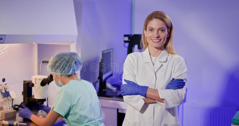 Embryologist Performing Artificial Fertilization in Laboratory Setting ...