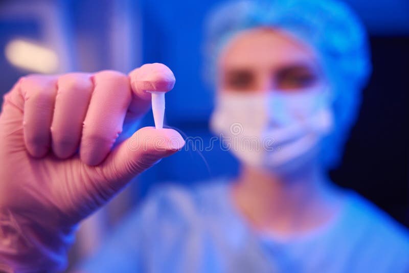 Embryologist is Showing Cryovial Filled with Cryopreserved Biological ...