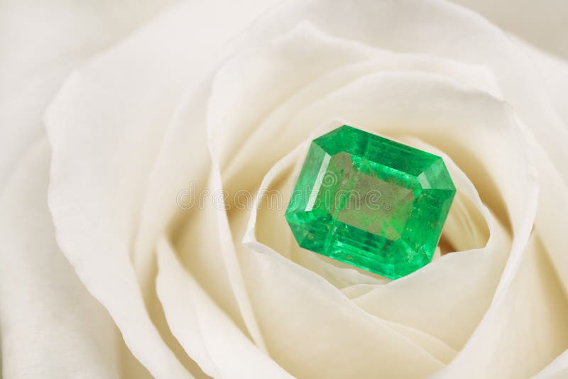 Emerald Gemstone on Flower stock photo. Image of jewelry - 248598534