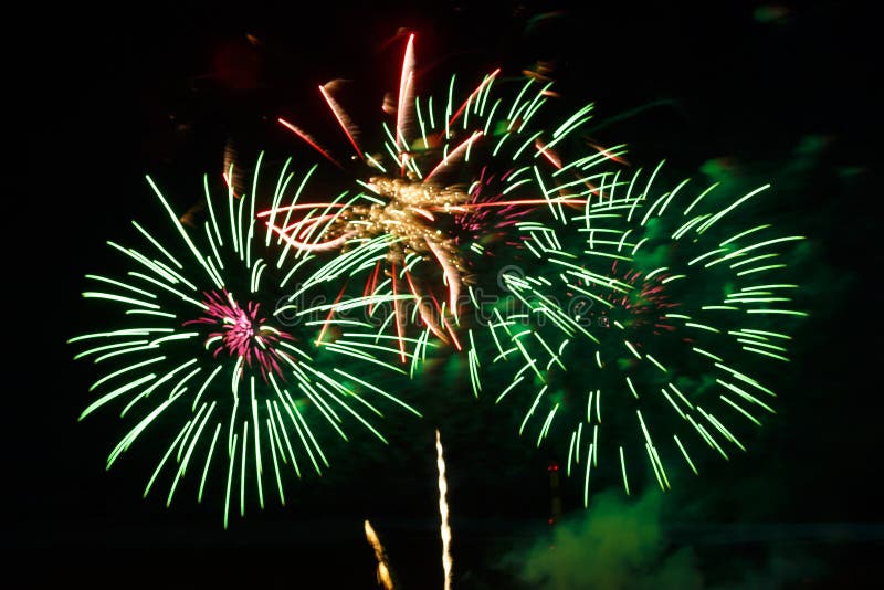 Golden Sparks of Fireworks Bright Shining on the Black Night Sky. Stock ...