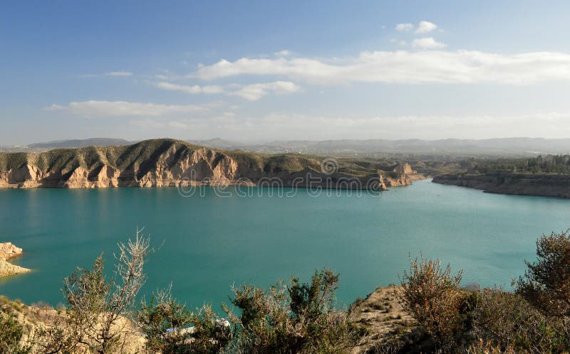 Emerald green lake waters stock photo. Image of lake - 87595746
