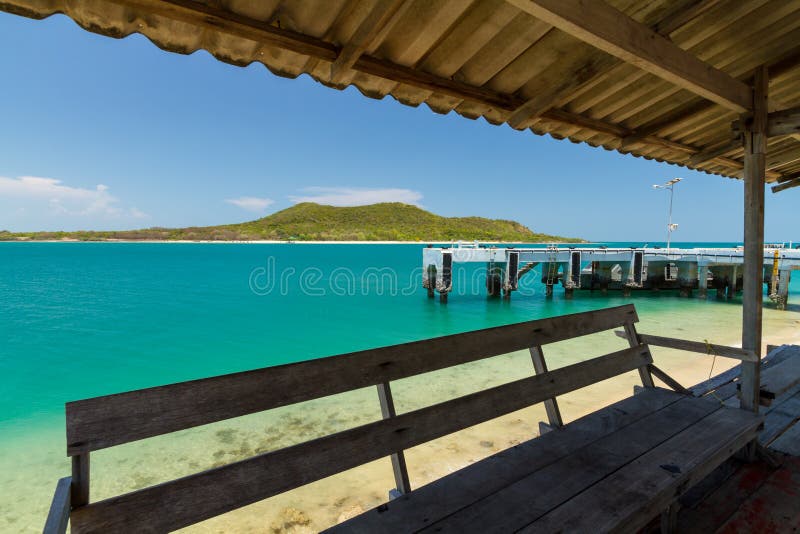 Emerald Green Water and Blue Sky with Jetty Stock Photo - Image of ...