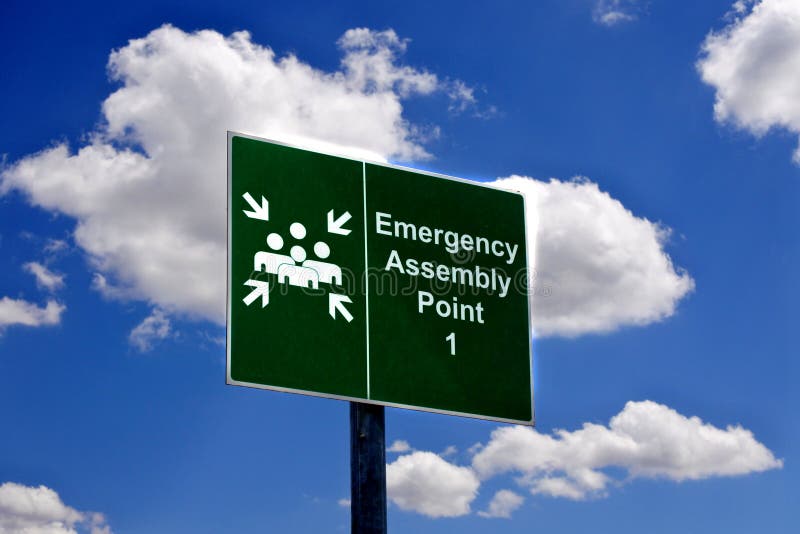 Emergency Assembly Point Sign Against Blue Sky Stock Photo - Image of ...