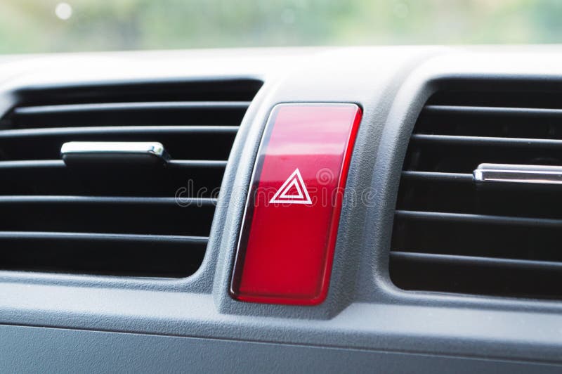 Emergency Warning Button with Triangle Pictogram on Panel in a Car ...