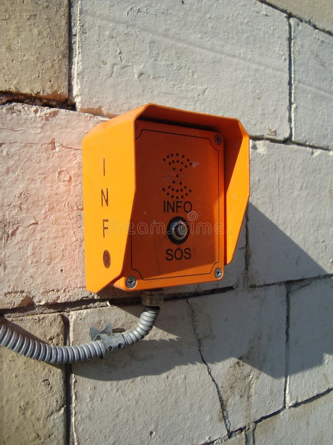 SOS button on the wall stock photo. Image of sign, yellow - 221284614