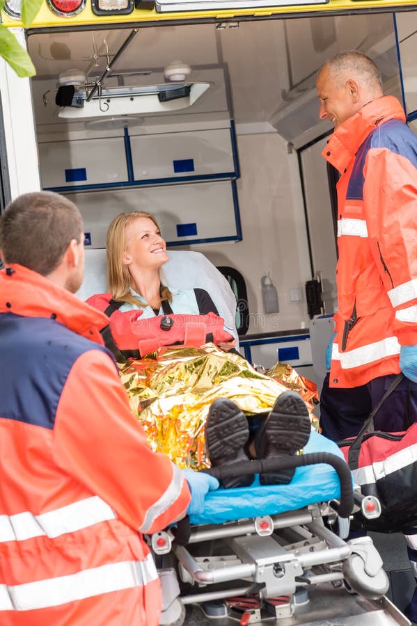 Emergency Doctor with Woman in Ambulance Stock Photo - Image of medical ...