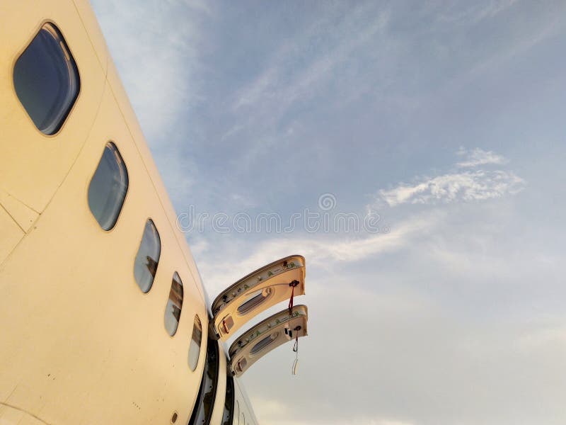 Emergency exit in aircraft stock image. Image of plane - 209190631
