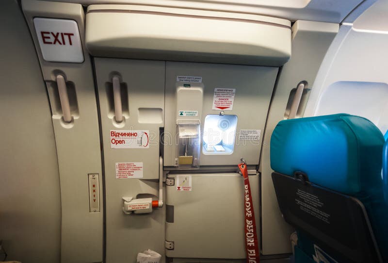 Emergency Exit Door in Airplane Stock Image - Image of doorway ... Emergency Exit Door in Airplane Stock Image - Image of doorway ...