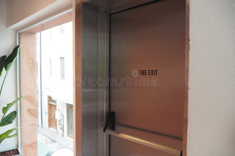 Emergency Exit Door in a Building . Stock Photo - Image of door ...