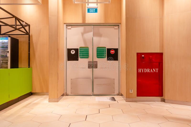 Emergency Exit Door and Hydrant Box in a Shopping Center Stock Photo ...