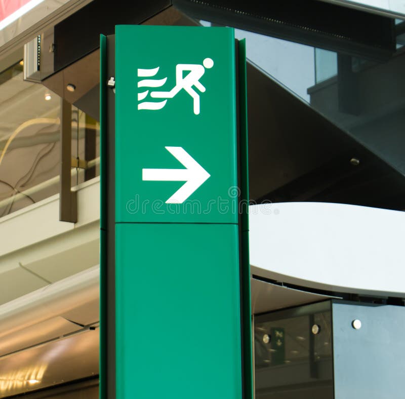 Airport Emergency Exit Sign At An International Airport Stock Photo ...