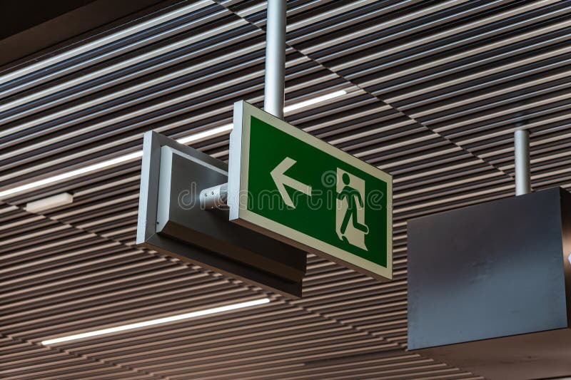 View on Emergency Exit Sign. with Running Figure and Arrow To the Left ...