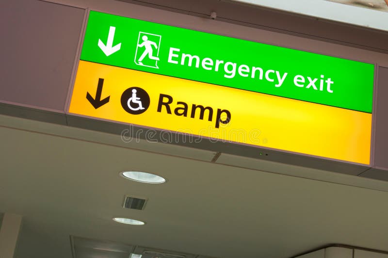 Emergency Exit and Ramp Access Sign Stock Image - Image of green ...