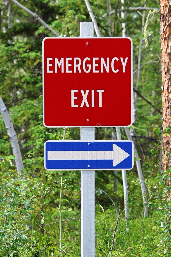 A Emergency Exit Sign With An Arrow Indicating The Direction Stock ...