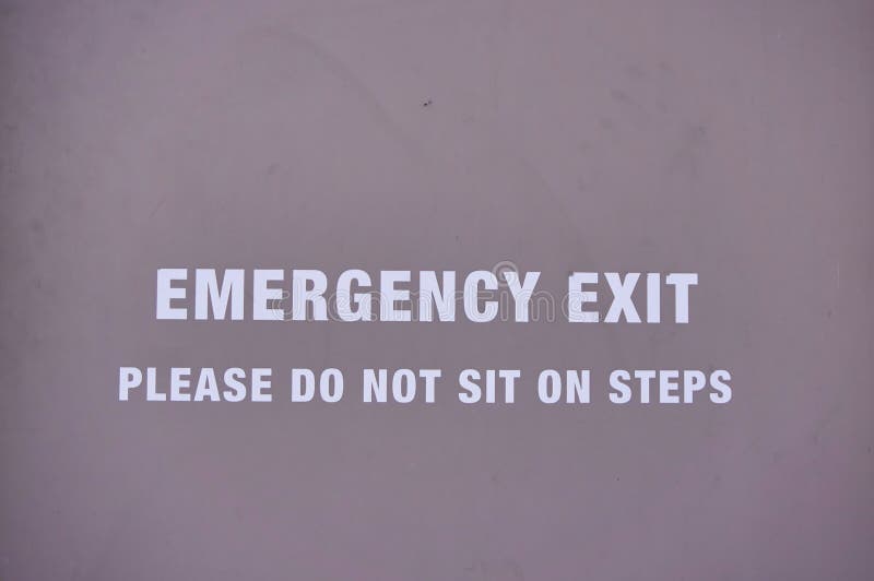 Emergency Exit Sign on Door Stock Photo - Image of exit, steps: 268676996