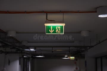 Emergency Exit Sign stock image. Image of basement, night - 375087789
