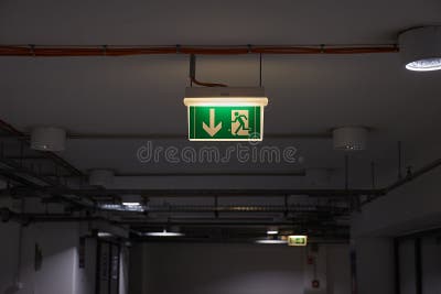 Emergency Exit Sign stock image. Image of basement, night - 375087789