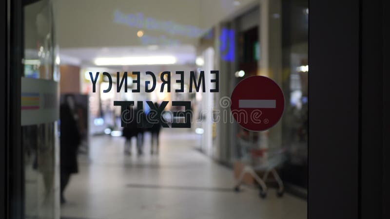 Emergency Exit Sign on Empty City Mall during Pandemic Stock Video ...
