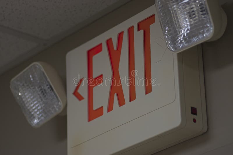 Flood Lights with an Exit Sign Stock Image - Image of arrow ...