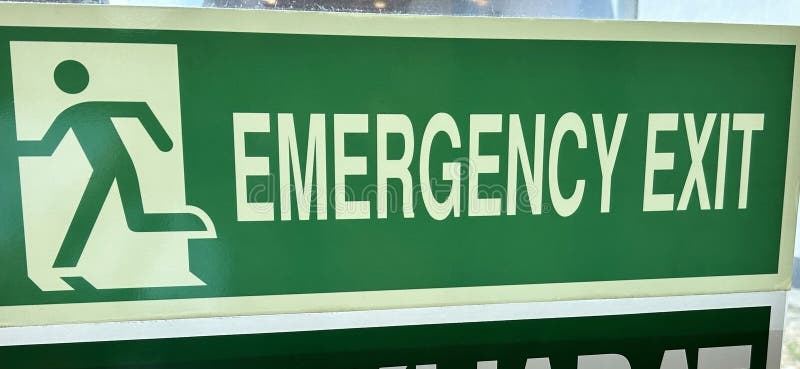 Emergency Exit Sign on a Glass Door Stock Image - Image of exit ...