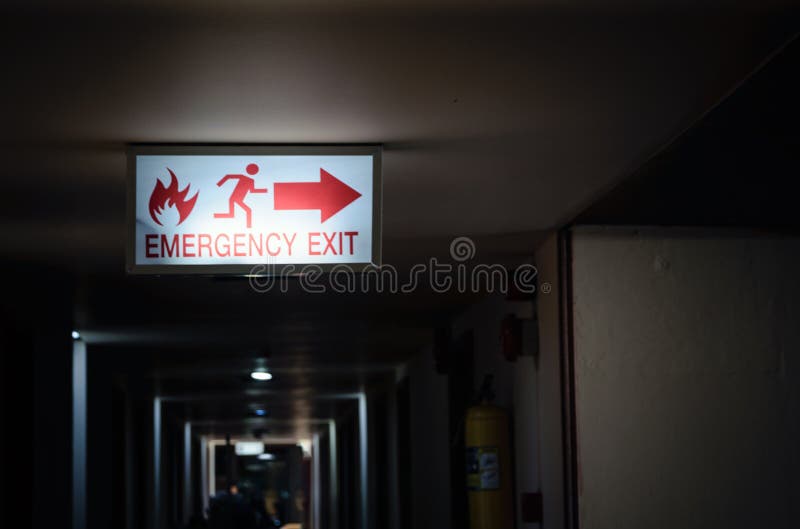 Emergency Exit Sign Light Showing Way To Escape in Dark Path Way at ...