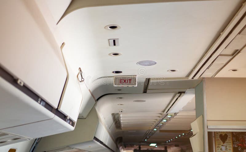 Emergency Exit Sign on a Passenger Plane Stock Image - Image of safety ...