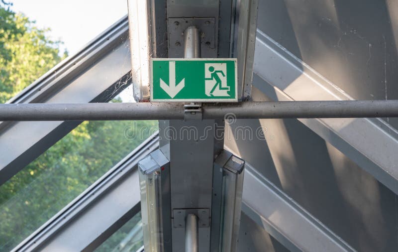 Emergency Exit Sign Protected by Glass Structure for Enhanced Safety ...