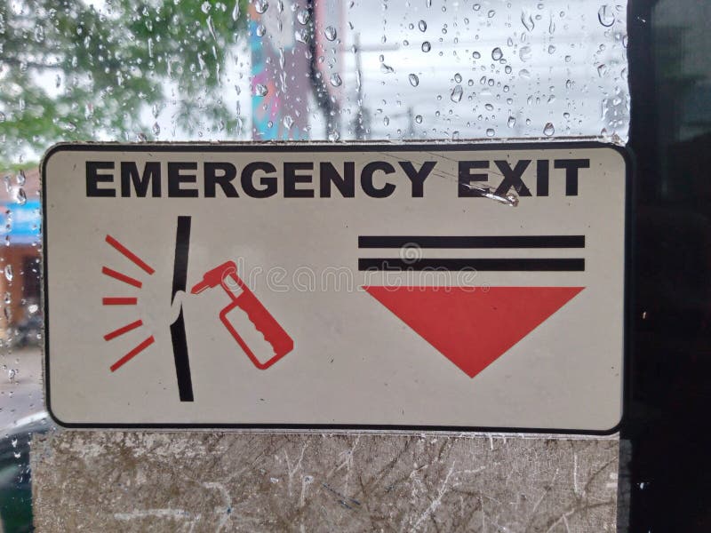 An Emergency Exit Sign on Public Transportation Such As Buses. Stock ...