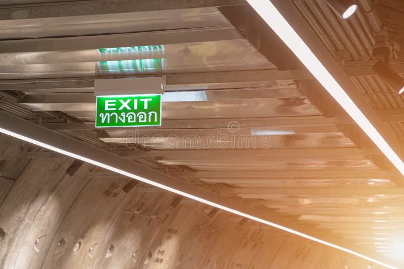Emergency Exit Sign in a Tunnel. Stock Photo - Image of emergency, exit ...