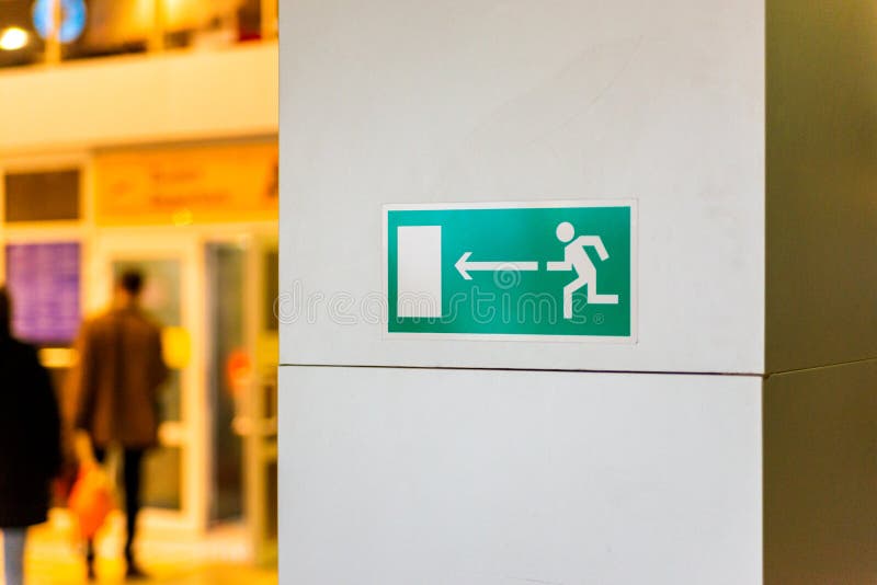 Emergency Exit Sign on Wall in Public Place Stock Image - Image of ...