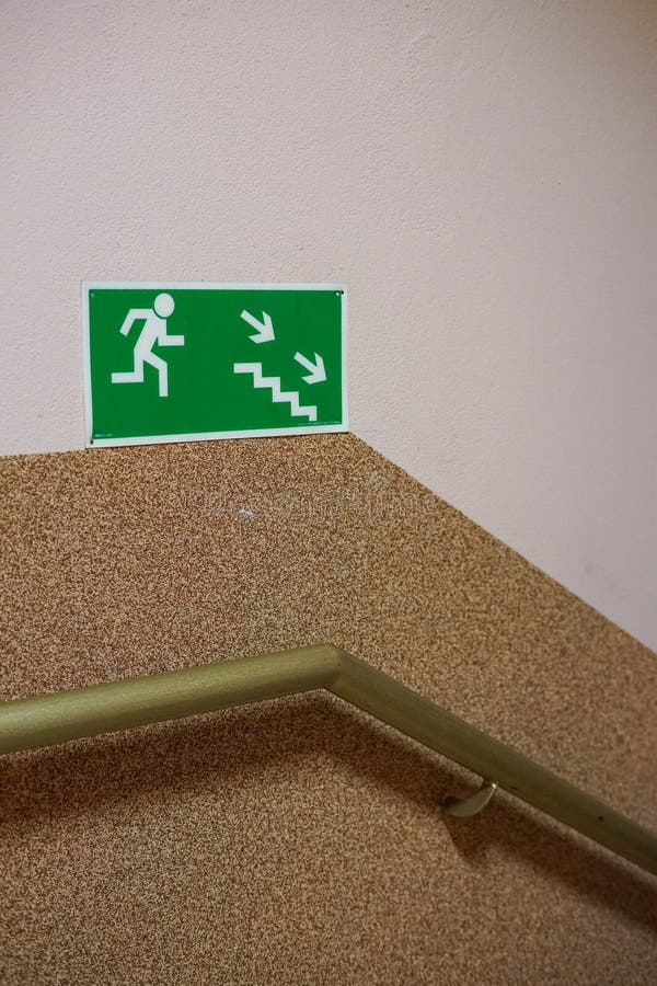 Emergency Exit Stairway Sign on the Wall Stock Image - Image of ...