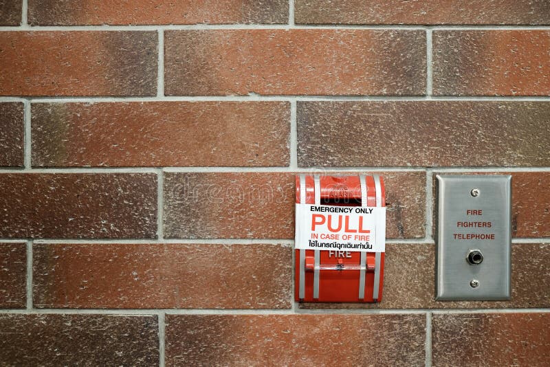 Emergency Fire Alarm Switch on Red Brick Wall Background Stock Image ...