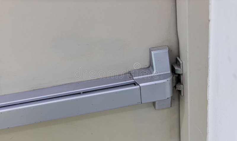 Emergency Fire Exit Door. Closed Up Latch and Rusty Door Handle of ...