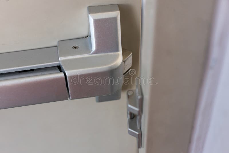 Emergency Fire Exit Door. Closed Up Latch and Rusty Door Handle of ...