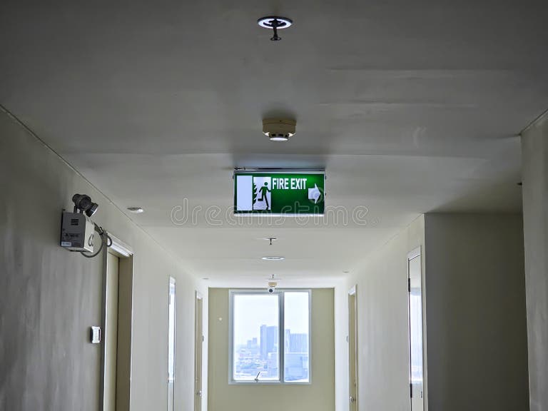 Emergency Fire Exit Sign in the Building Stock Image - Image of ...