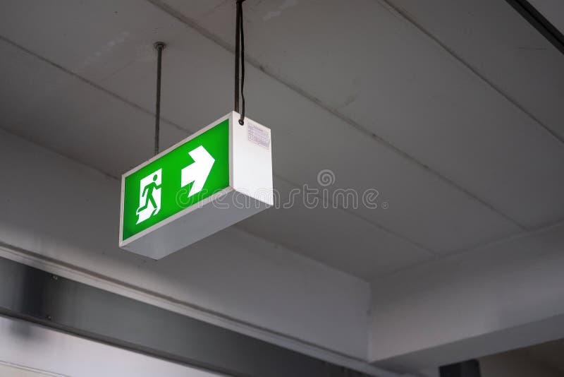 Emergency Fire Exit Sign at the Corridor in Building Stock Image ...