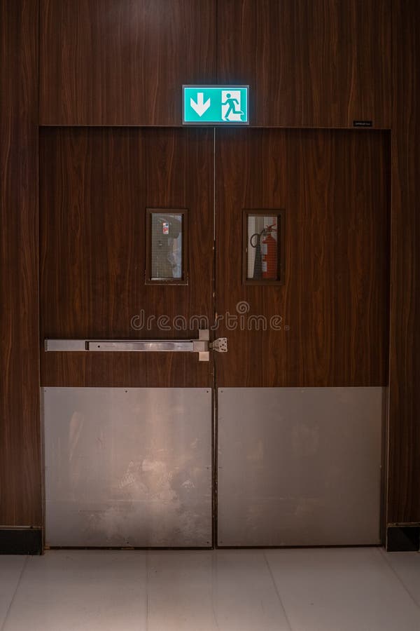 Emergency Fire Exit Sign at the Corridor in Building Stock Image ...