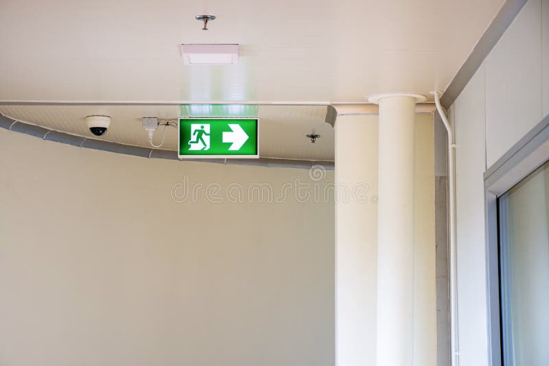 Emergency Fire Exit Sign Show the Way To Escape Stock Image - Image of ...