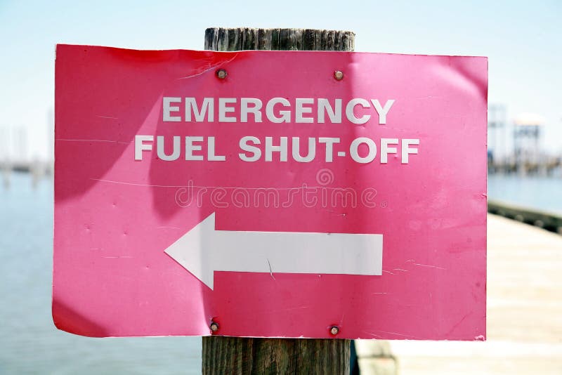 Emergency Fuel Shut-off Sign Stock Photo - Image of marina, weathered ...